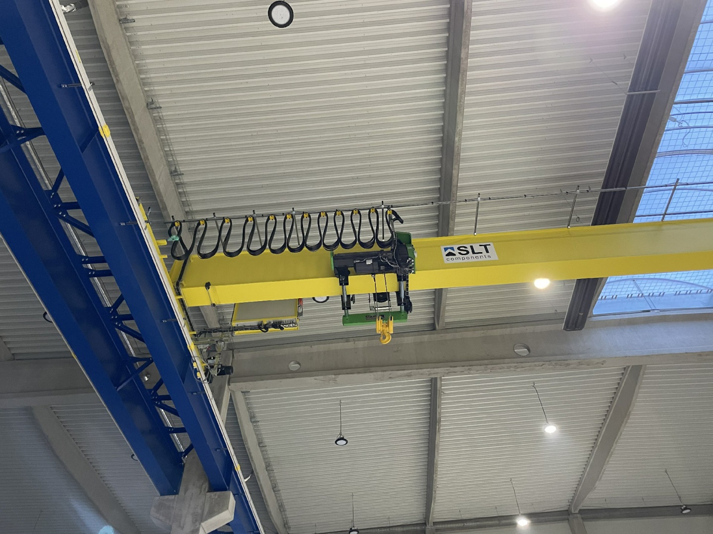 Energy supply of bridge cranes with enclosed conductor bars | SLT ...